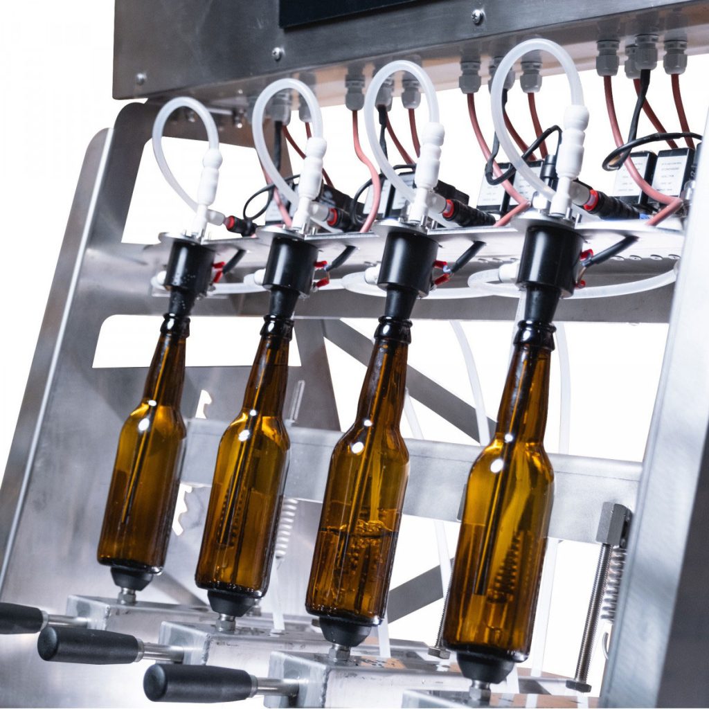Semi-automatic counterpressure bottle filler - 600 bottles per hour